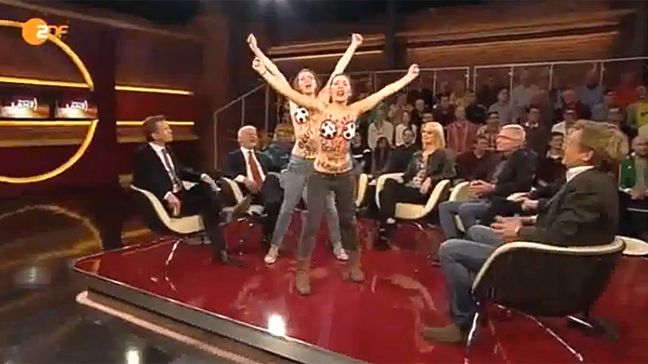 Topless FEMEN protesters storm German football TV show | Euronews