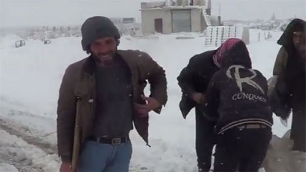 Two children freeze to death in Syria as snow storms sweep across ...