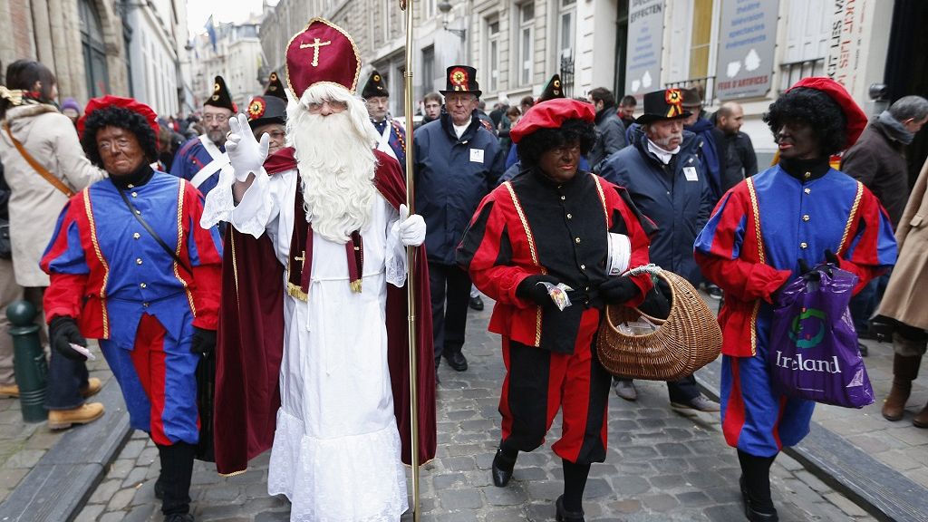 Dutch Santa's black-faced helper stokes anti-racism protest, police ...