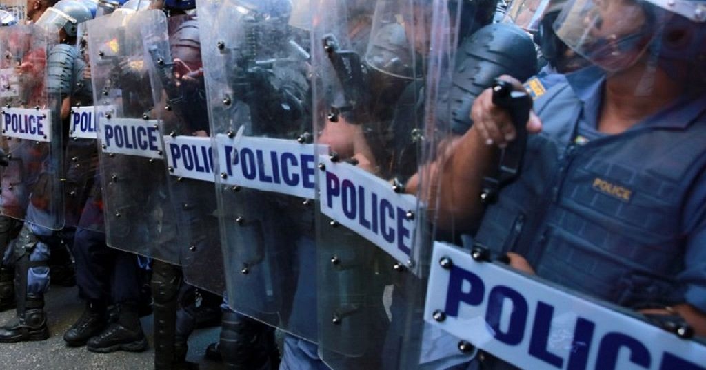 Angry residents clash with South African police during violent protest ...