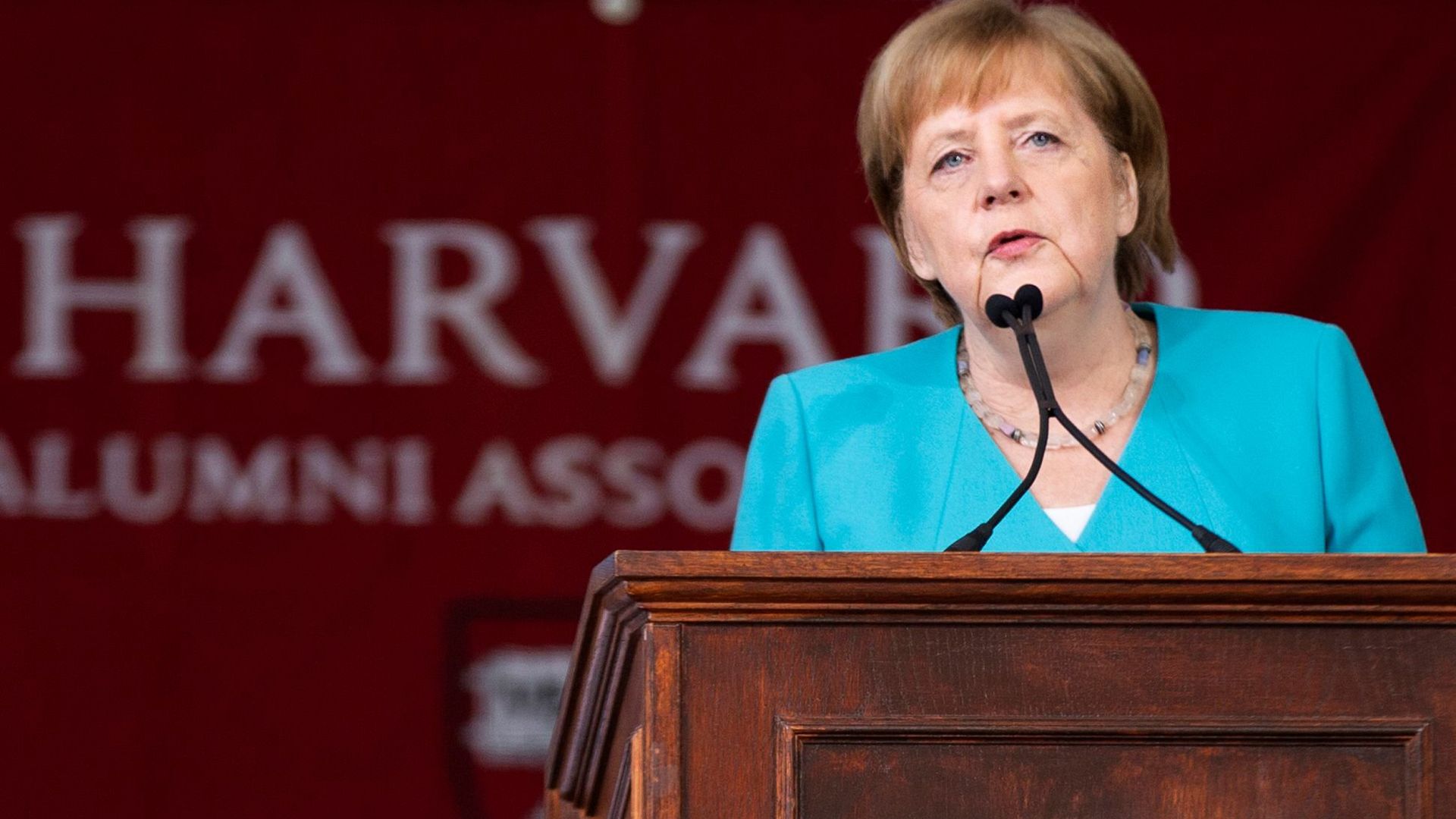 Merkel stresses importance of breaking down walls in Harvard graduation ...