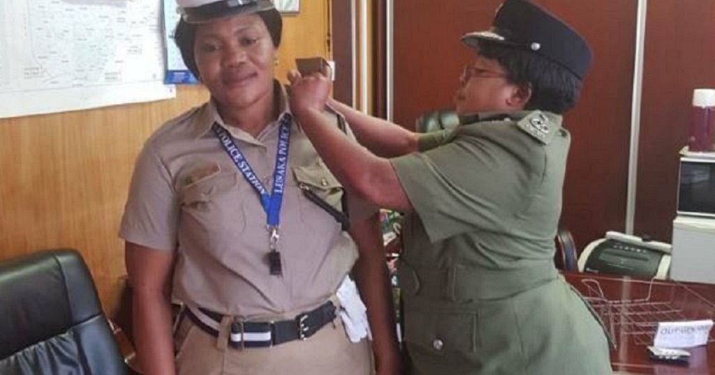 Zambia police constable promoted for braving heavy rain to control ...