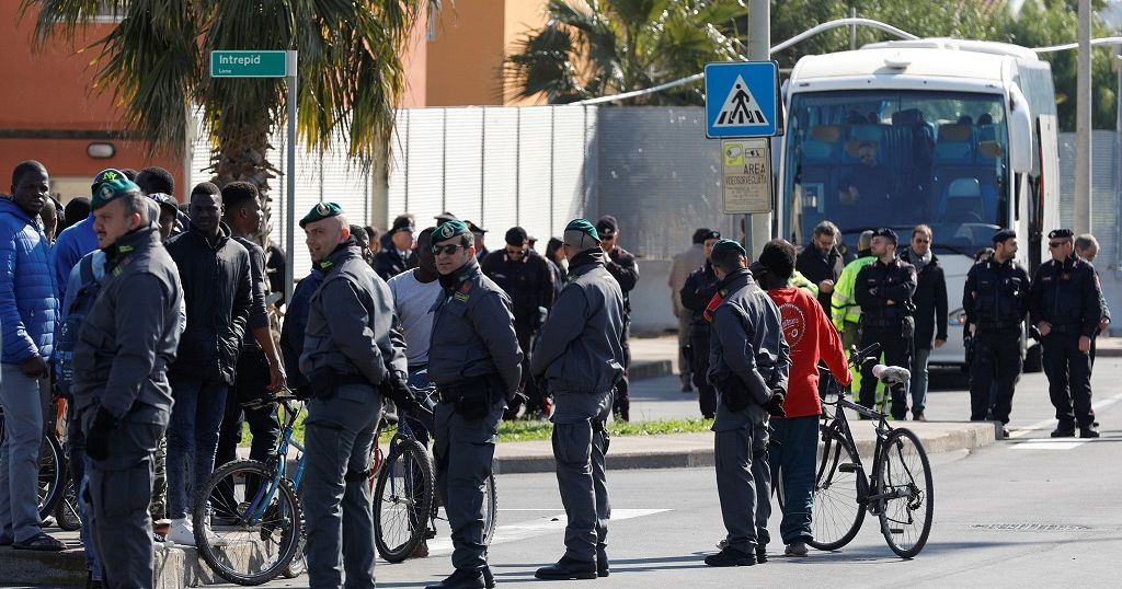 First batch of migrants transferred as Italy begins to close asylum ...