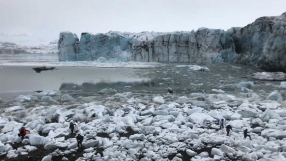 Watch: Tourists flee large wave after Icelandic glacier collapse | Euronews