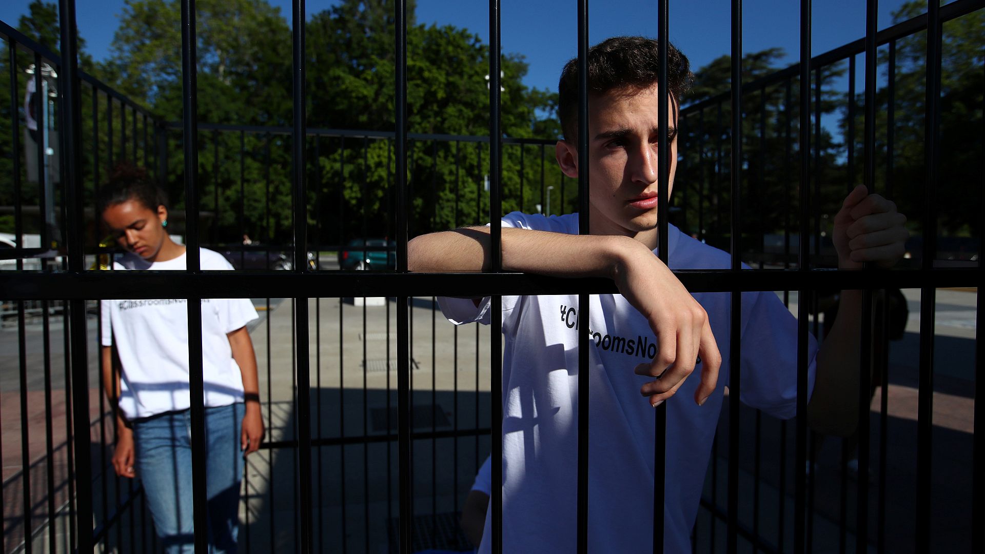 Teens in cage protest US immigration policy in front of UN European ...