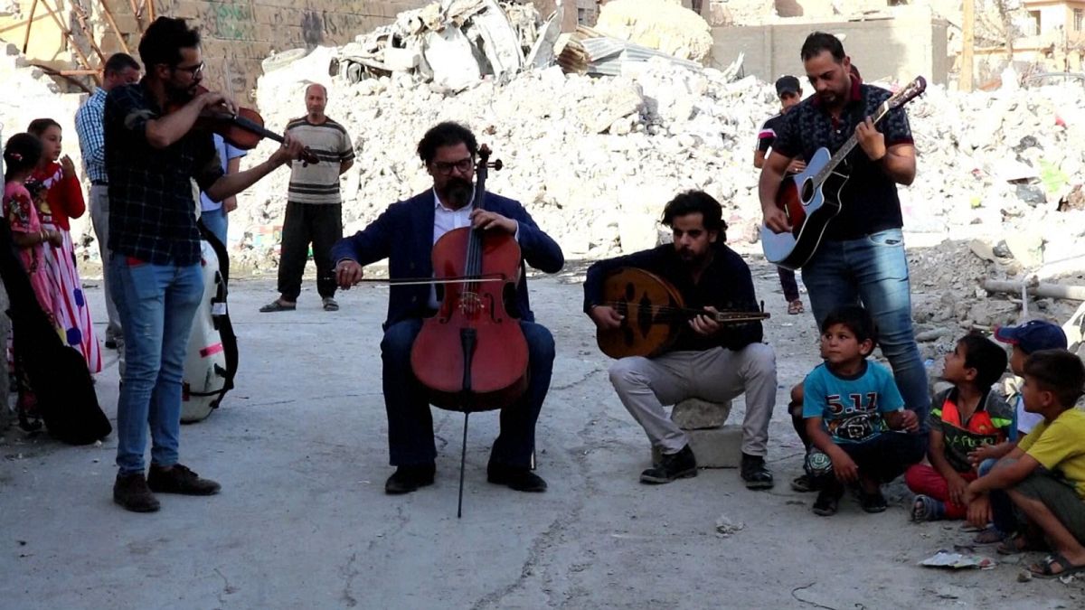 How is Iraqi cellist Karim Wasfi using music to fight terrorism? | Euronews