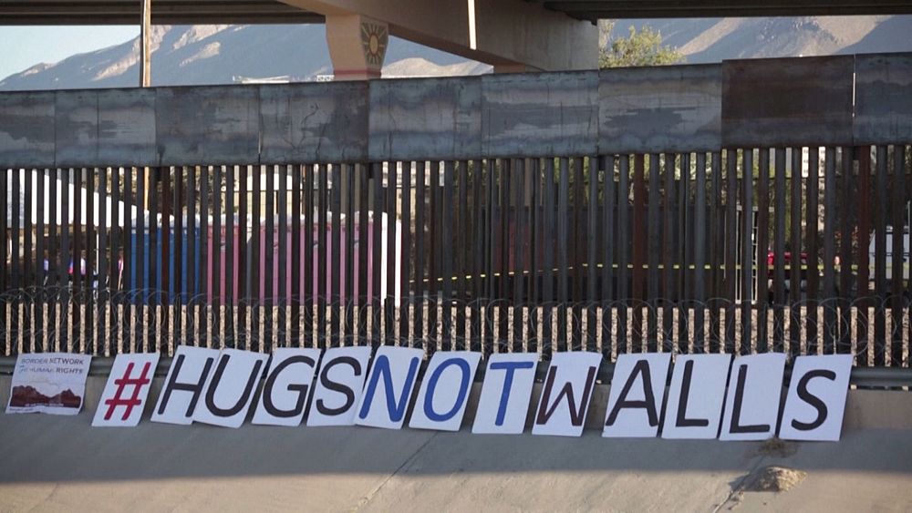 VIDEO : Families reunited in 'Hugs Not Walls' event at U.S.-Mexico ...