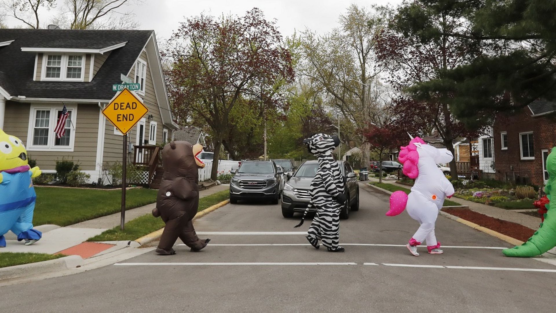 Video. Costume-wearing walkers boost morale amid Michigan's COVID-19 ...