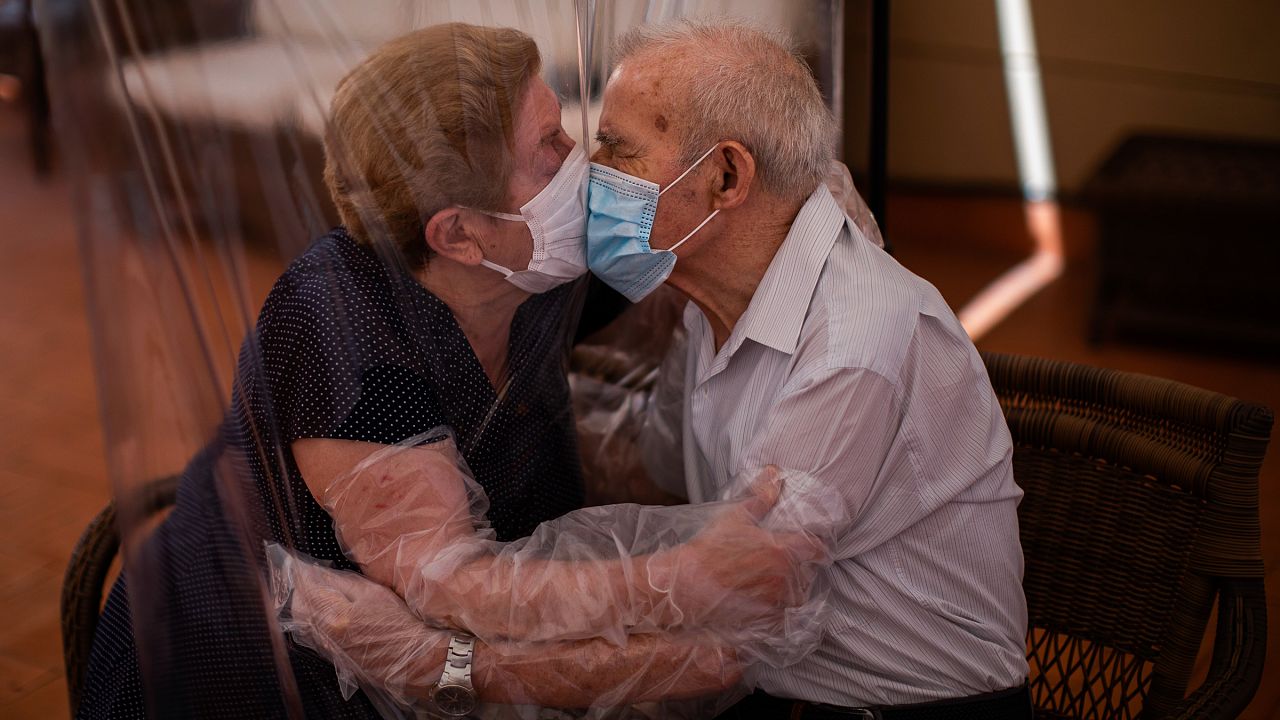 In pictures: Emotions overflow as Spanish nursing home allows hugs ...