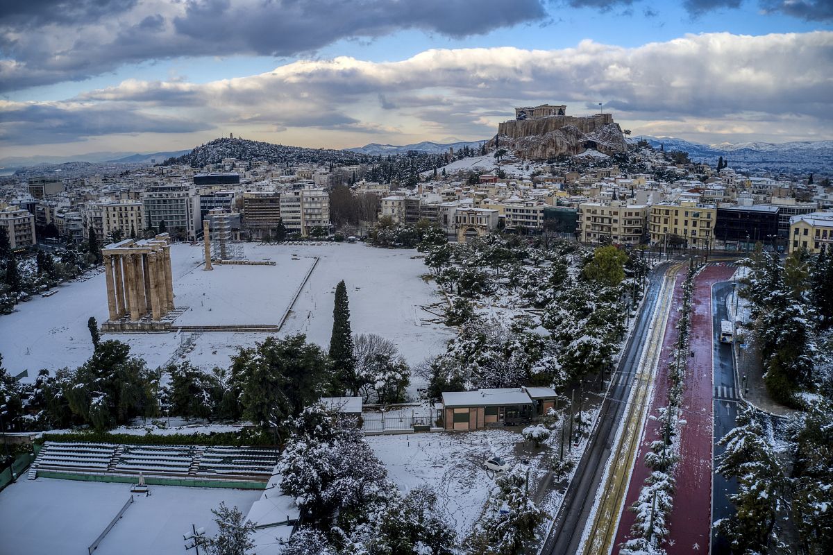 The iconic Acropolis in Athens is covered in snow for the first time in ...