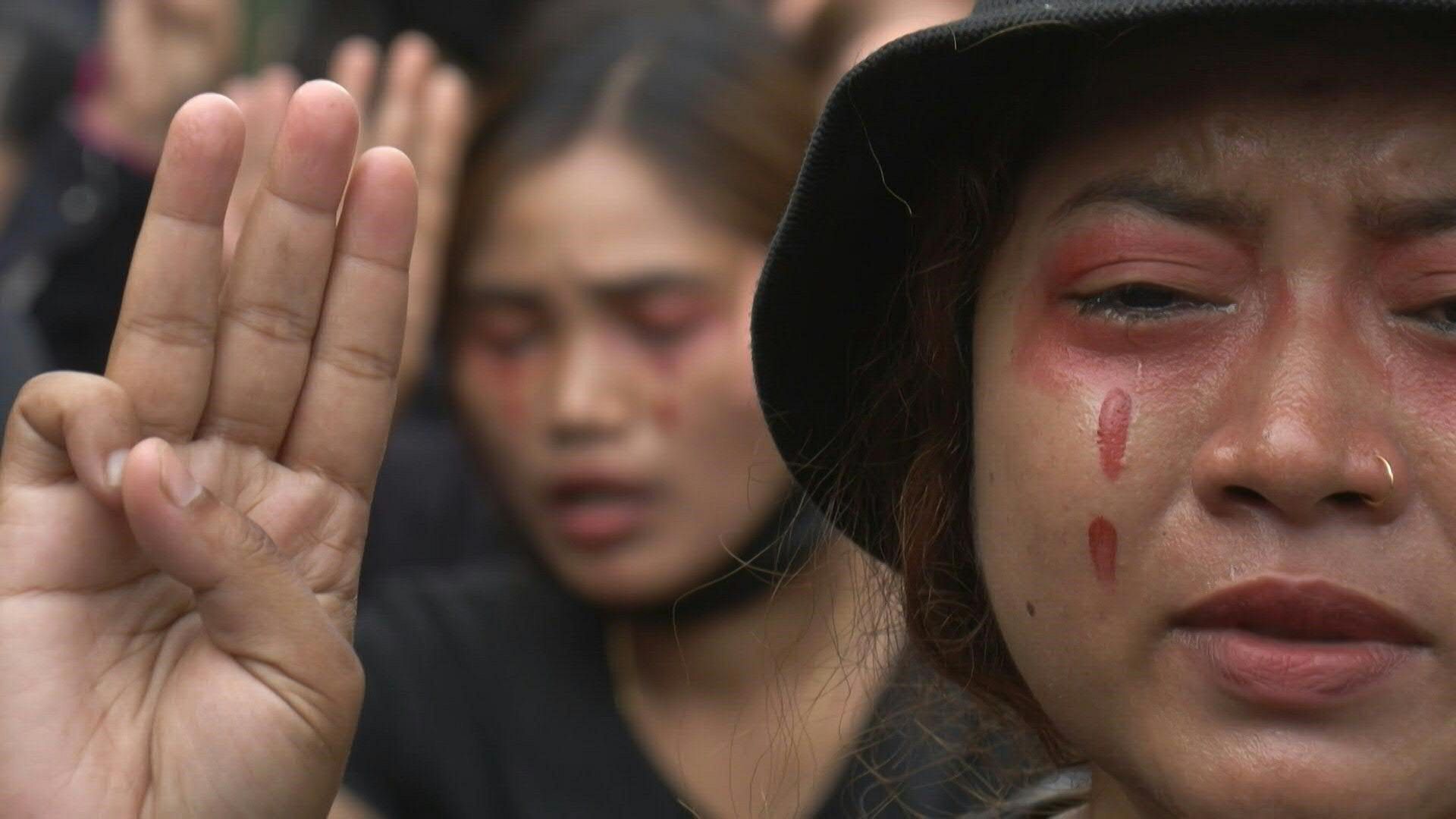 Video. Crying and song as Myanmar anti-coup protesters don red 'blood ...