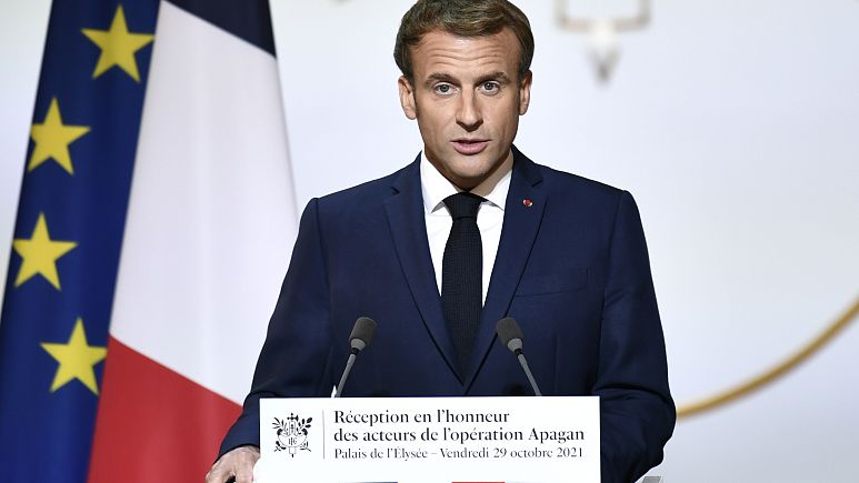 Macron reverts French flag to navy blue from lighter EU shade | Euronews