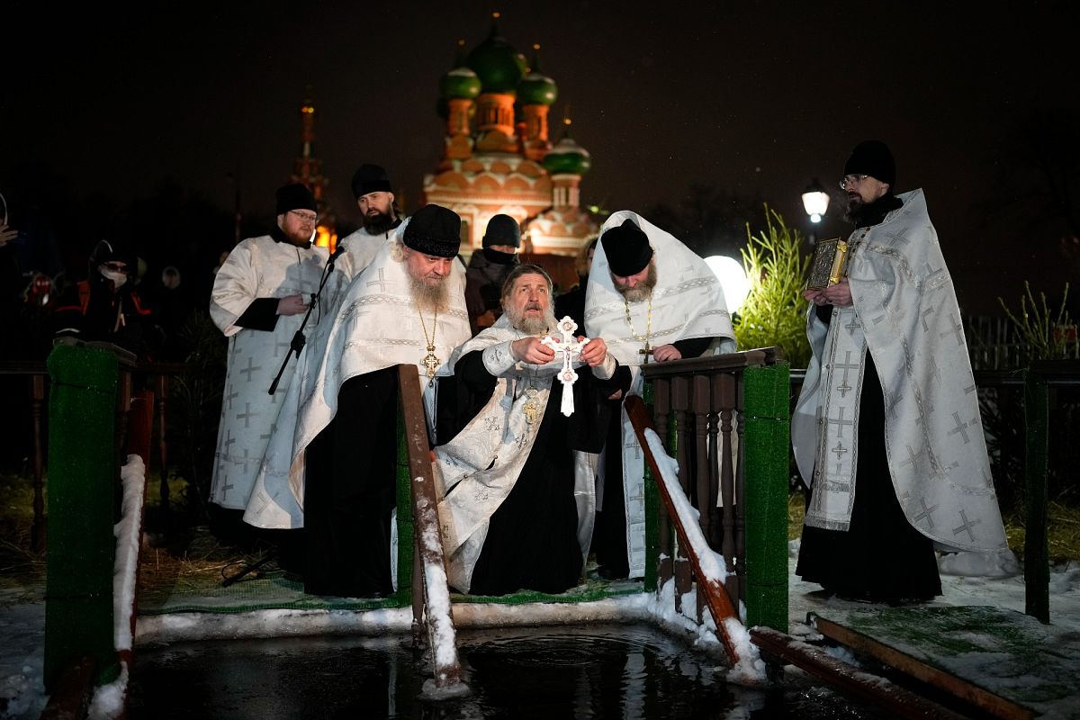 In pictures: Russian Christians plunge into icy water to mark Epiphany ...