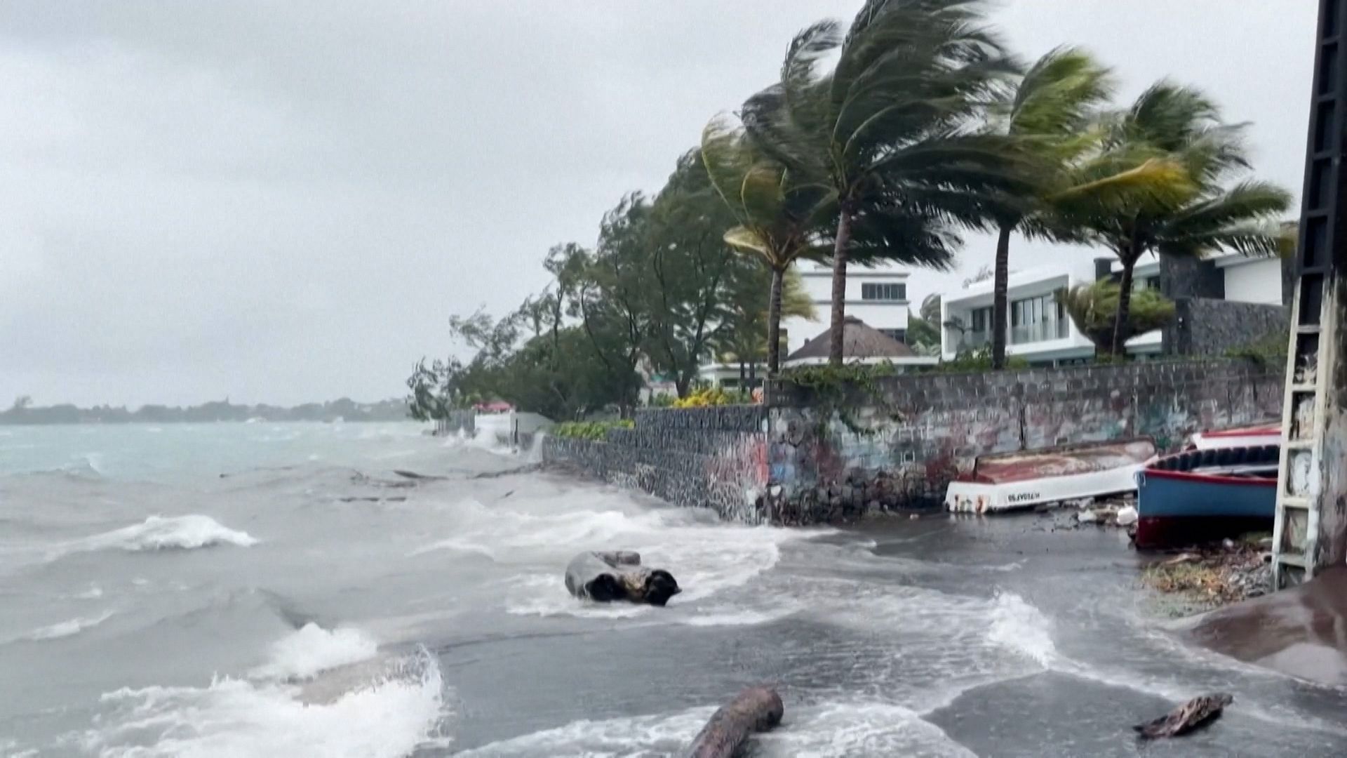 Video. Strong winds, flooded roads as cyclone winds hit Mauritius and ...