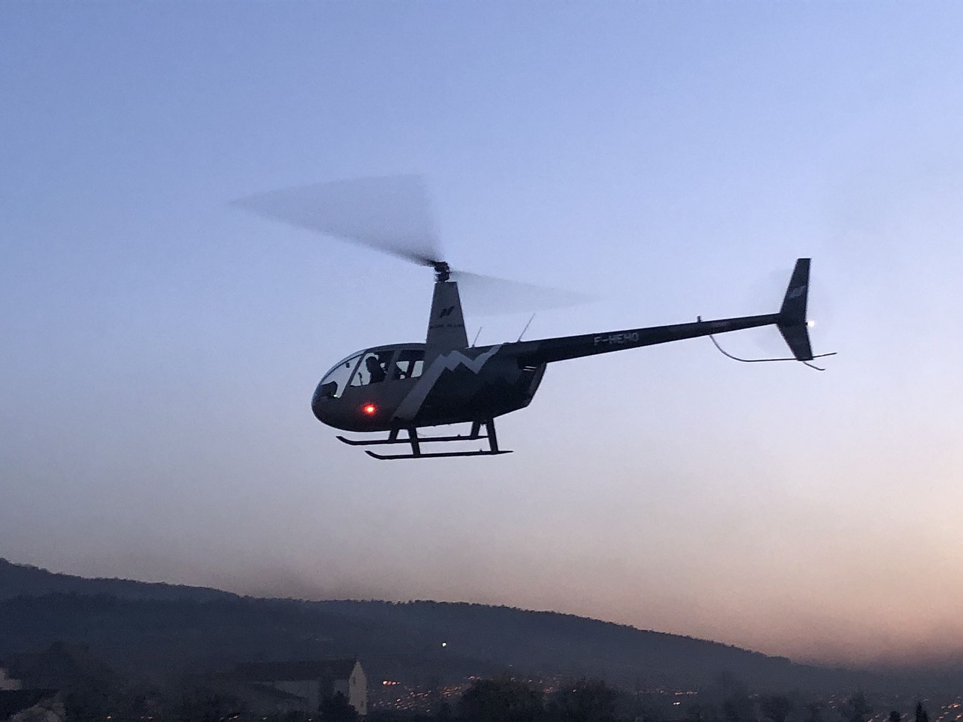 How do helicopters help winegrowers stave off freezing temperatures in ...