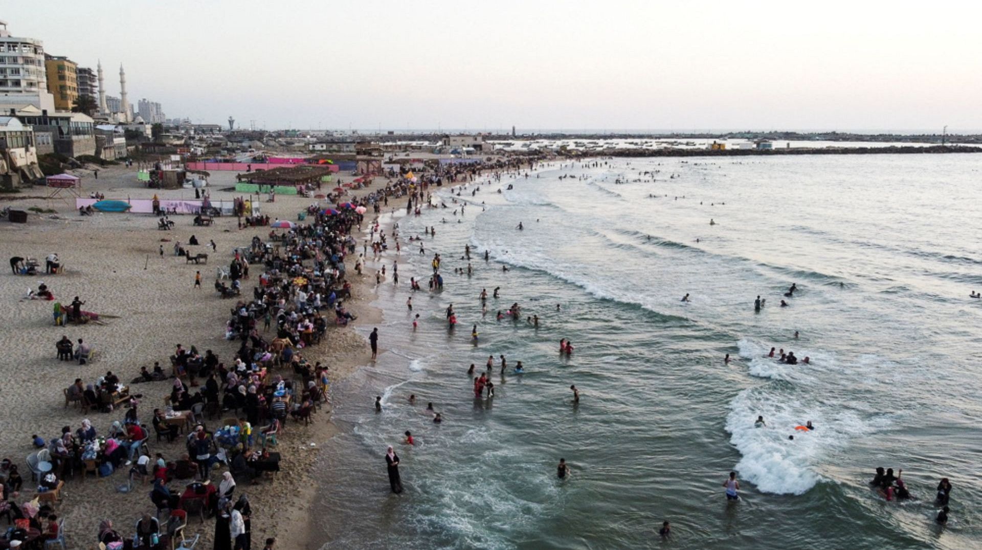 People of Gaza swim in 'crystal blue' sea again, as sewage pollution ...