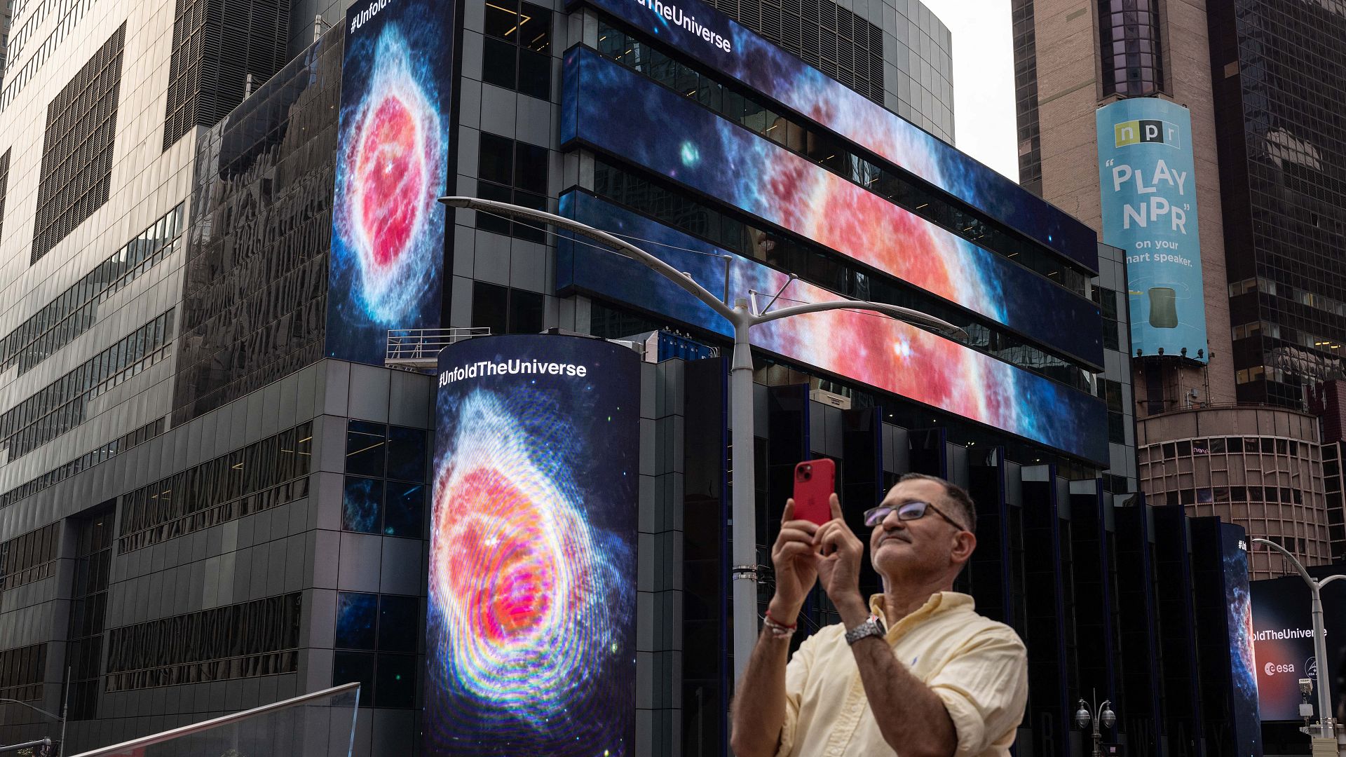 Video. Screens in Times Square display images from Space Telescope ...