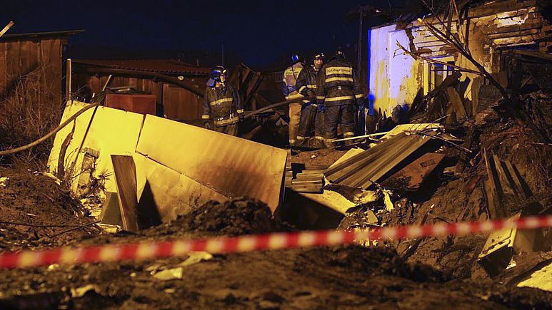 Russian fighter jet crashes into a two-storey building in Siberia, both ...