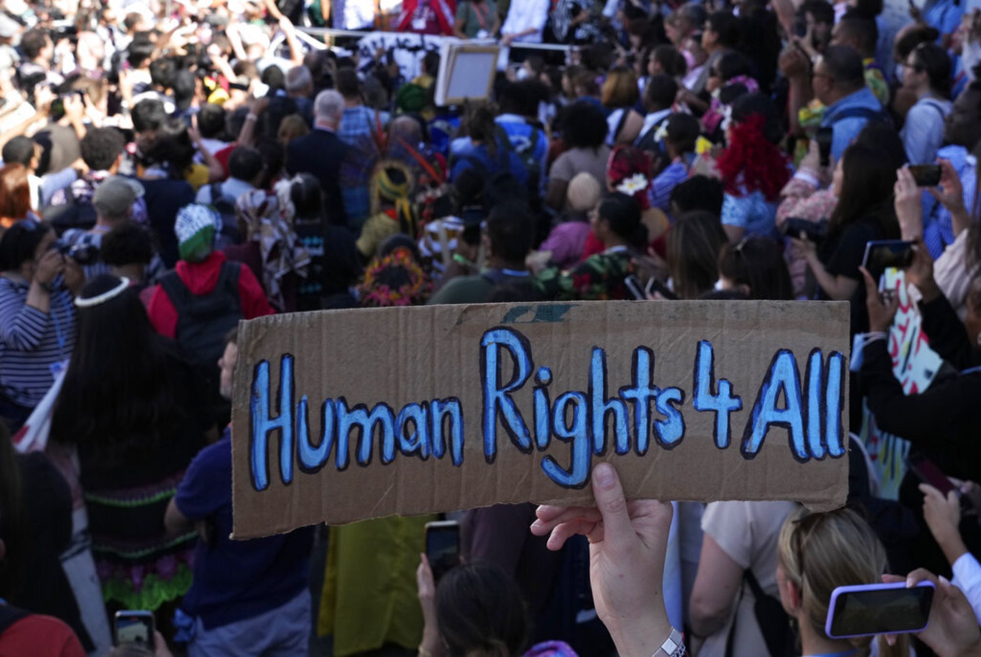 Hundreds of people march through UN climate conference in first big ...
