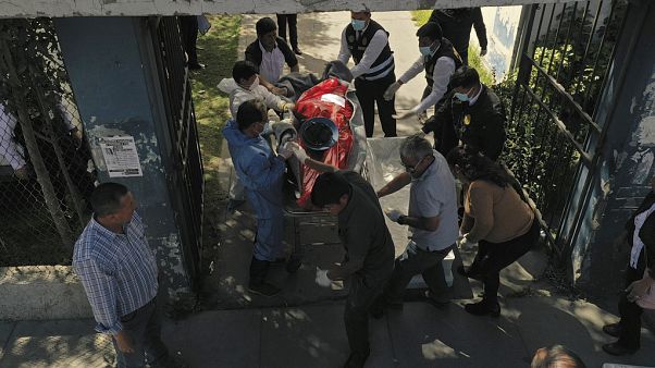 Bodies of 27 Peruvian mine fire victims taken to morgue | Euronews