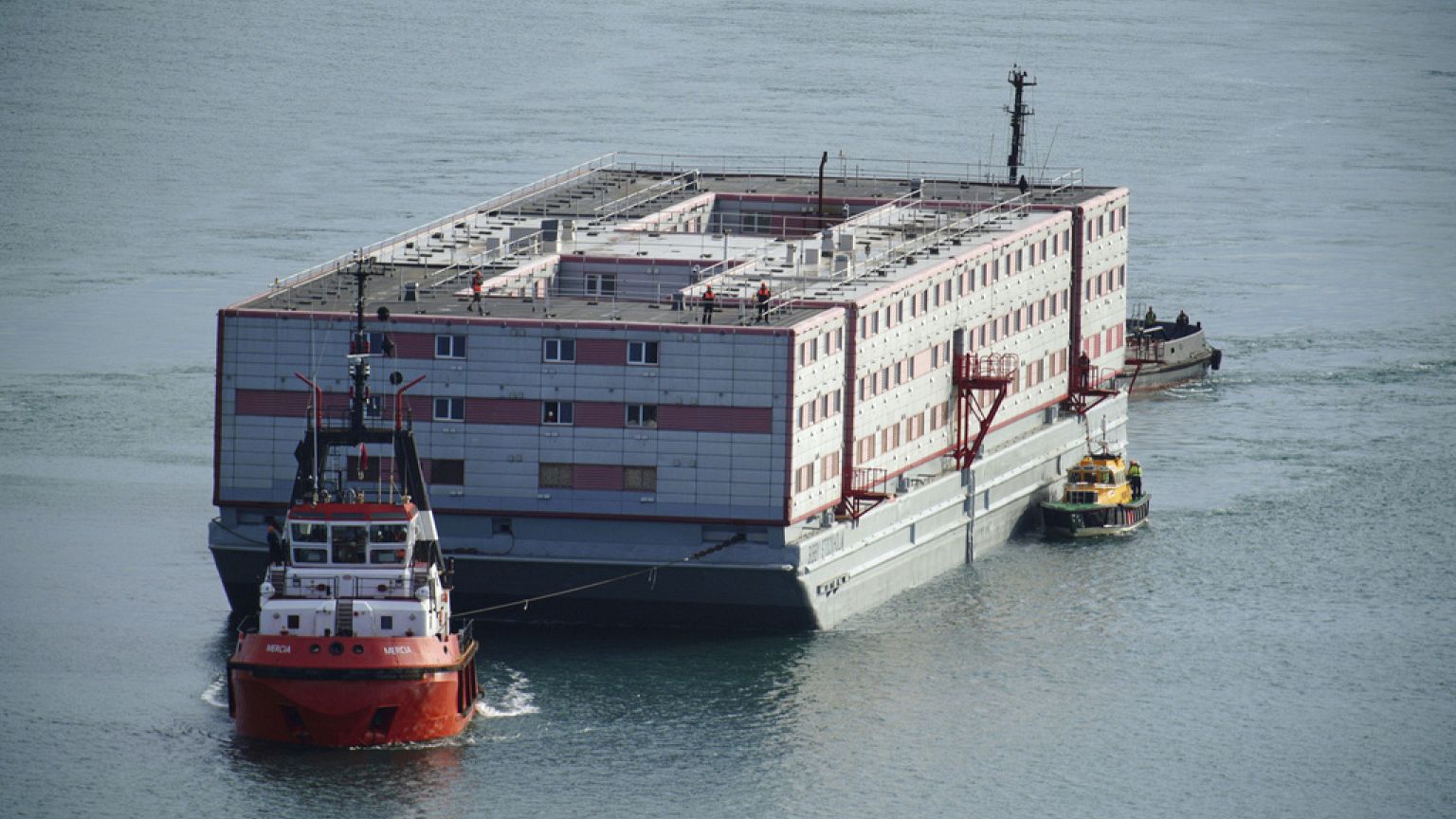 Asylum seeker accommodation barge arrives as UK passes controversial ...