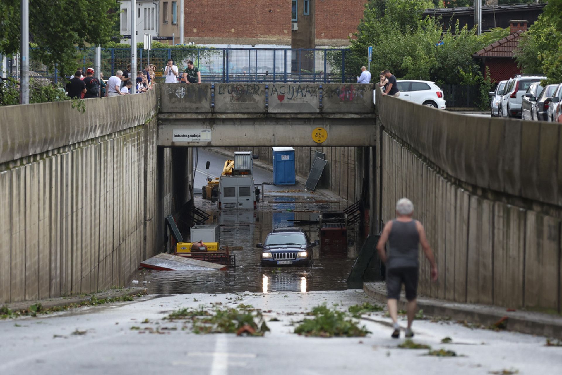 A powerful storm sweeps Balkans region after days of heat, killing at ...