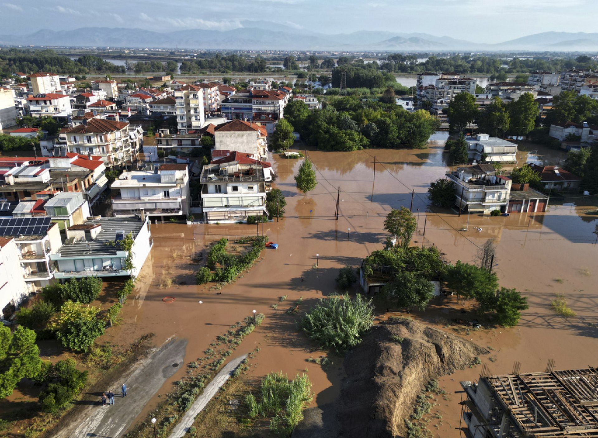 Evacuation orders for areas in central Greece as a river bursts its ...