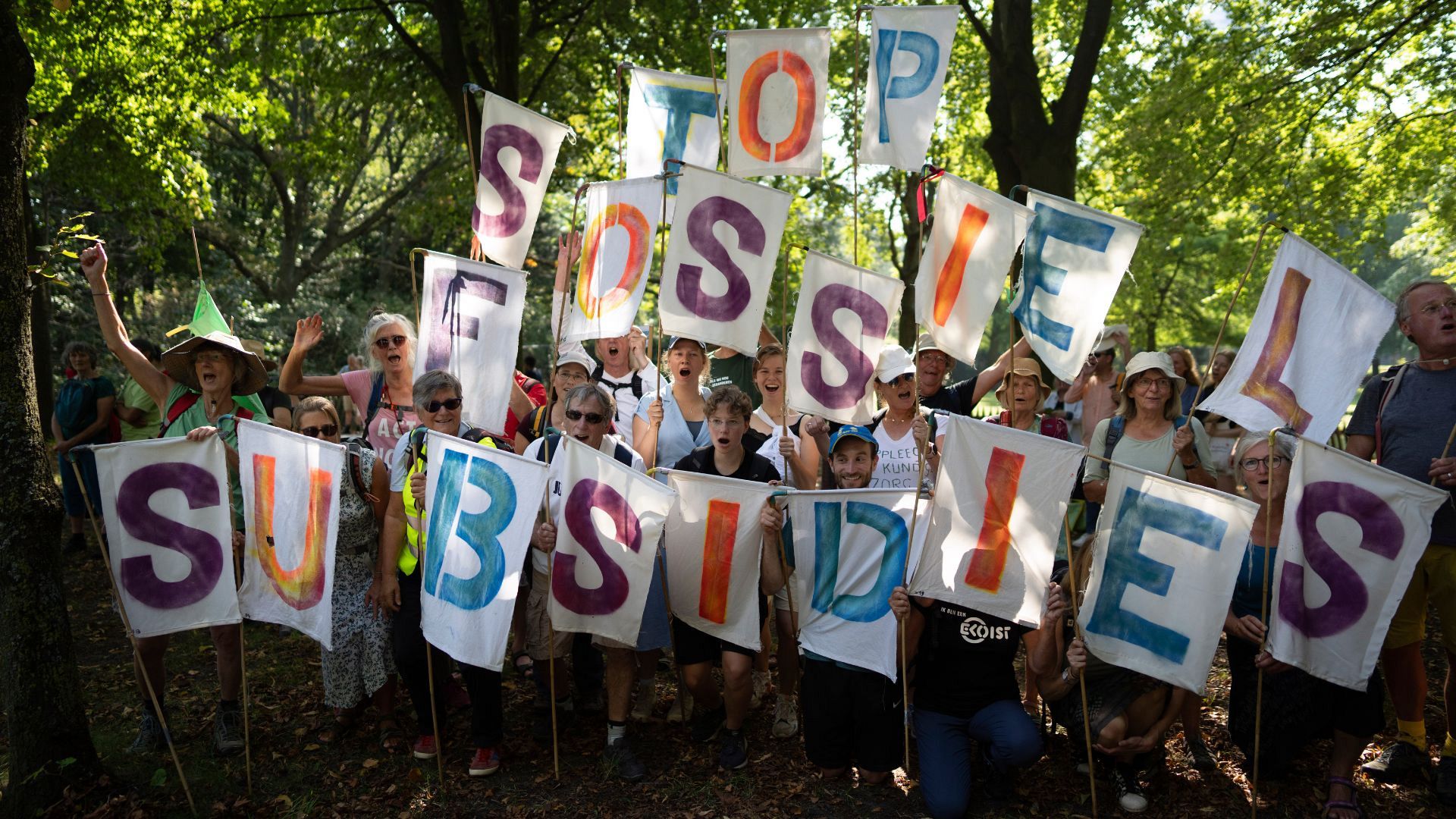 Dutch police fire water cannons and detain thousands of protesters in ...