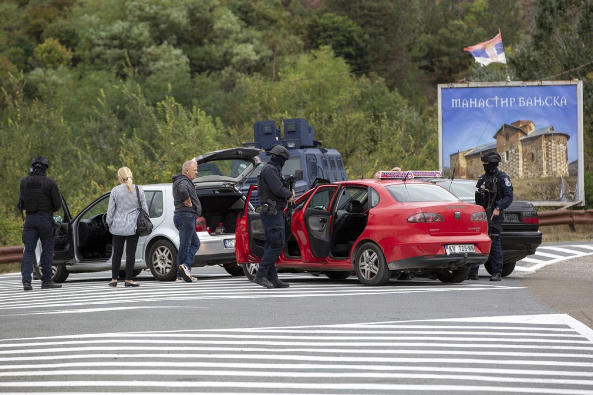 Kosovo mourns a slain police officer, some Serb gunmen remain at large ...