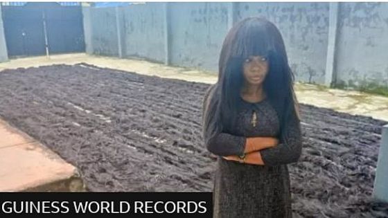 Nigerian woman sets Guinness World Record for longest hand-made wig ...