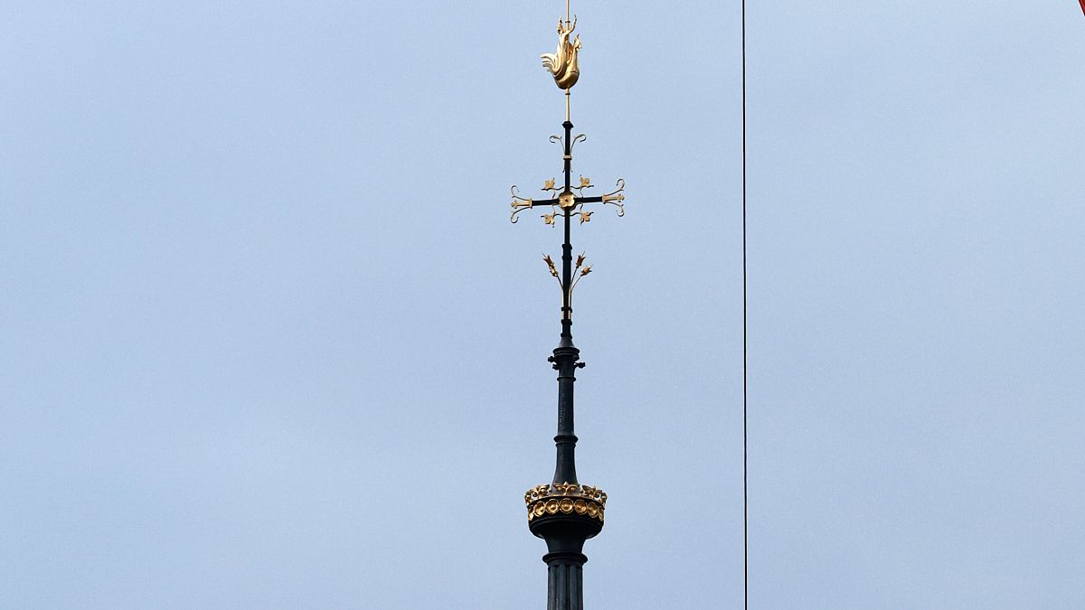 Notre Dame reveals new spire and golden rooster as scaffolding removed ...