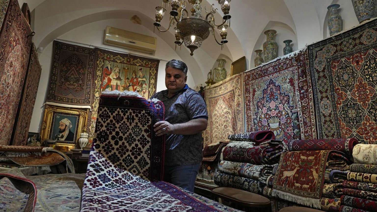 How the rug got pulled out from under Iran's traditional carpet weavers ...
