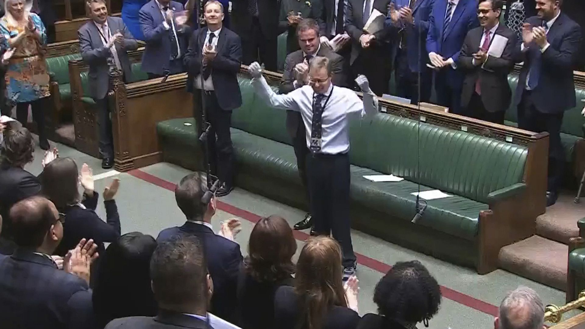 'Bionic' MP who had hands and feet amputated gets standing ovation on ...