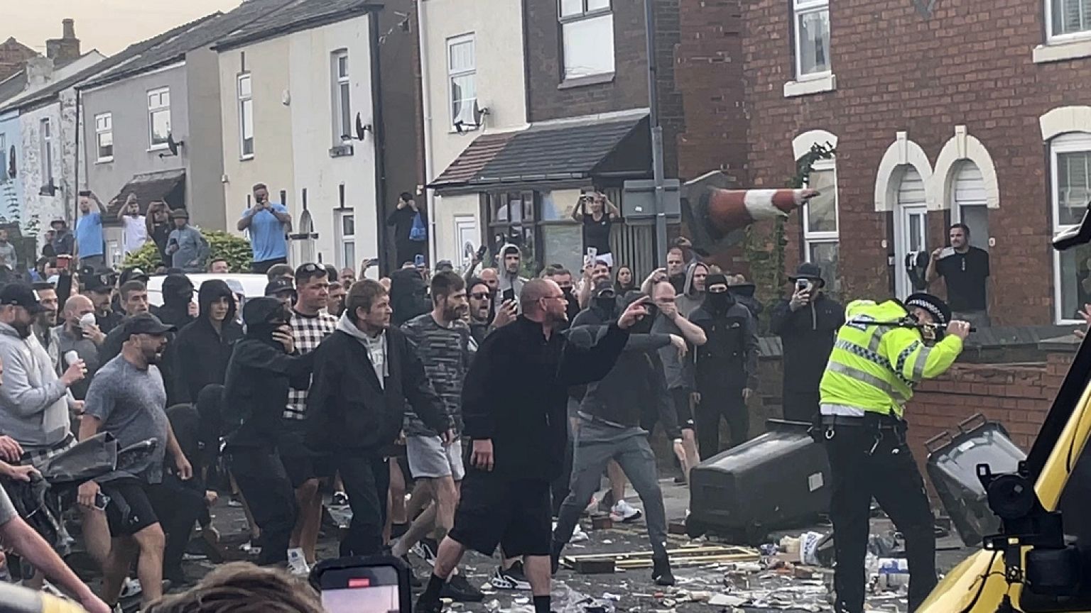 UK: Police clash with violent crowd near site of stabbing attack that ...