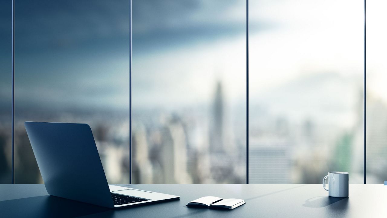 ‘Coffee badging’ is the new return to the office trend. What is it and ...