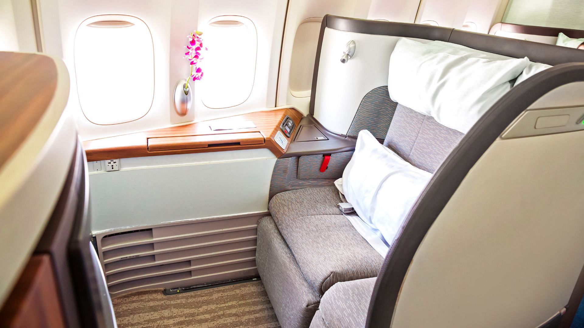 How to get a free flight upgrade, according to airlines and frequent ...