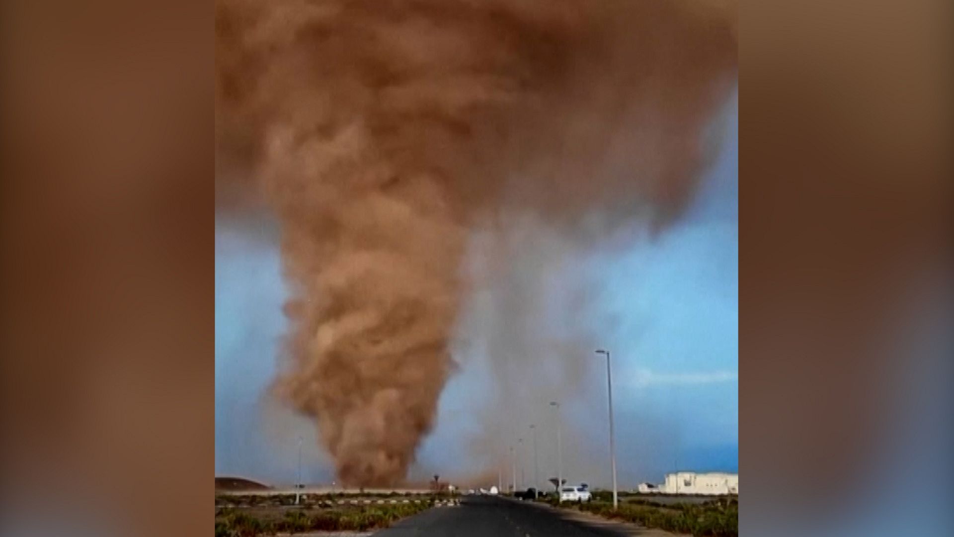 Video. Stunning footage of huge dust tornado swirling near Sharjah in ...