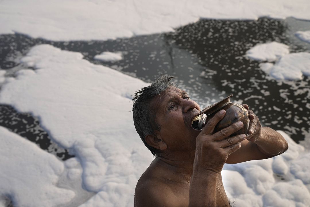 Toxic foam covers one of India's most sacred rivers putting millions of ...