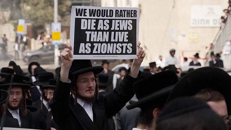 Video. Ultra-Orthodox Jews protest outside Israeli military enlistment ...