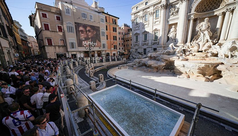 ‘Ugly’ pool for coins built next to Rome’s Trevi Fountain as city ...