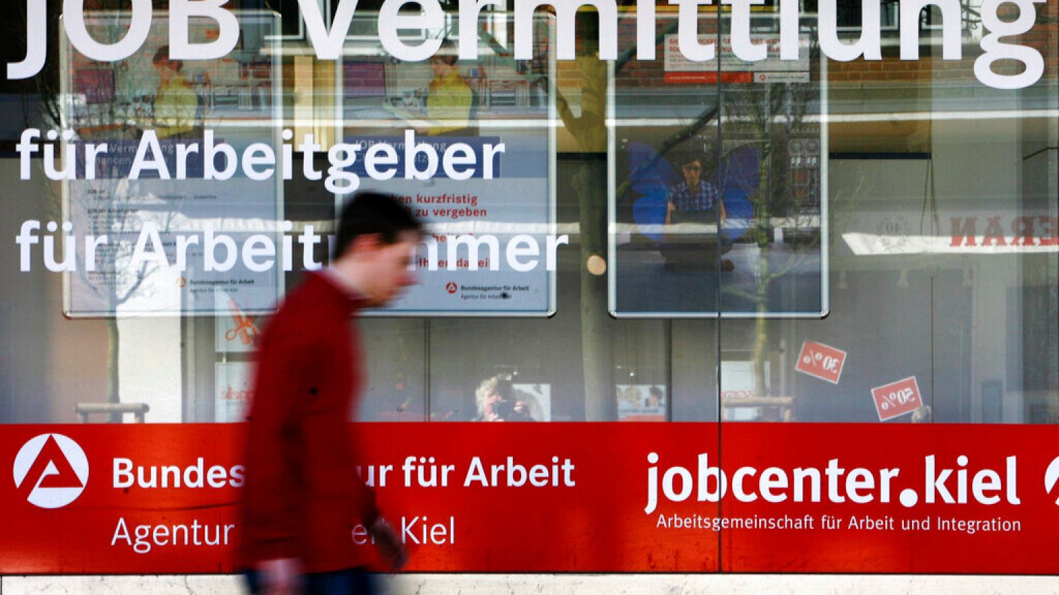 Germany's job market reliant on thousands of migrants per year, experts ...