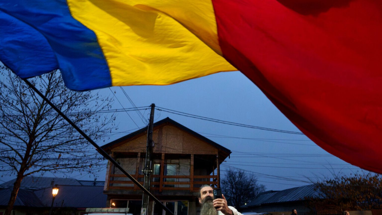 Romania's pro-EU parties clinch deal to form coalition government ...