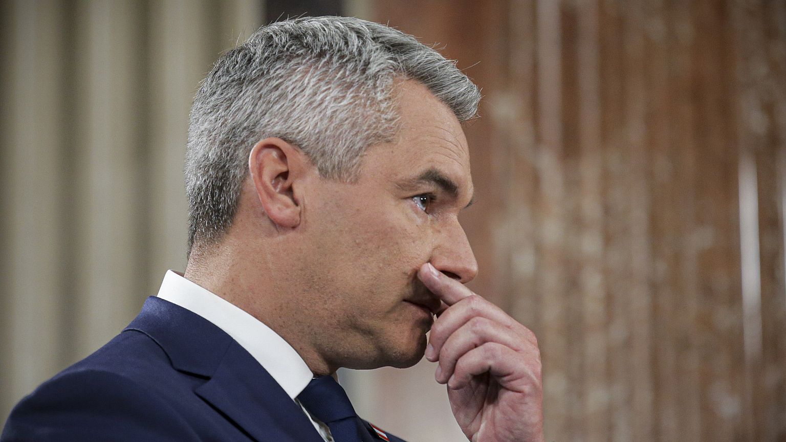 Austria's Chancellor Karl Nehammer says he will step down as coalition ...