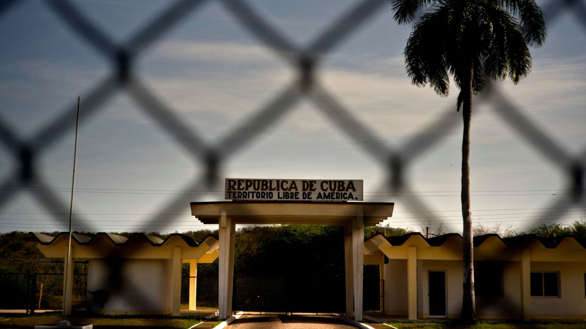 First military flight carrying deported US migrants lands in Guantanamo ...
