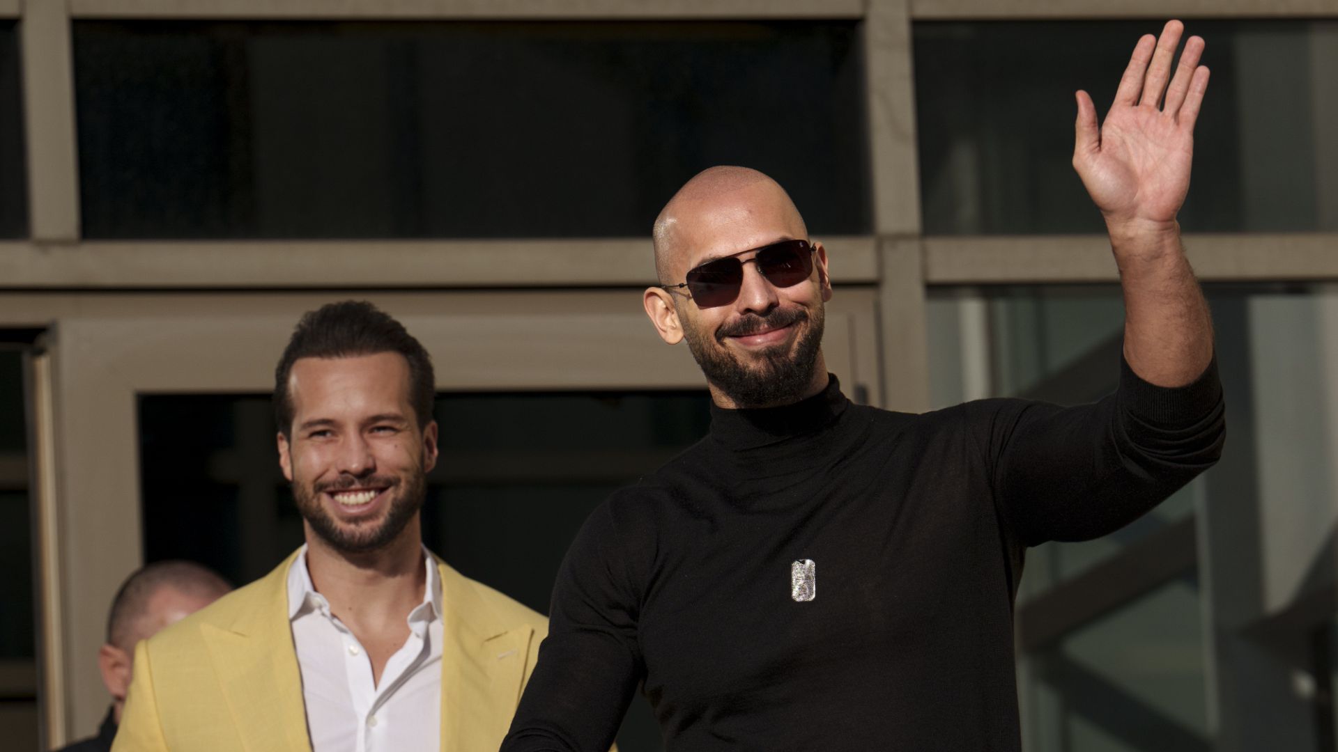 Controversial influencers Andrew and Tristan Tate leave Romania on US ...