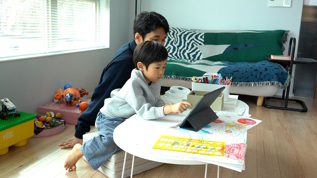 What does it mean to raise a child in the age of AI? One father is ...