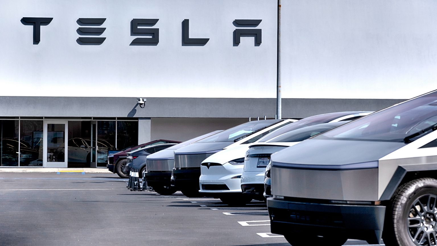 Musk vows to step back from DOGE job and put more time into Tesla ...