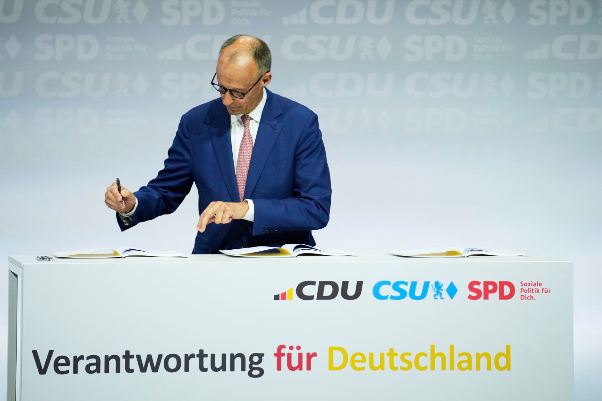 Germany's CDU/CSU and SPD leaders sign coalition agreement for new ...