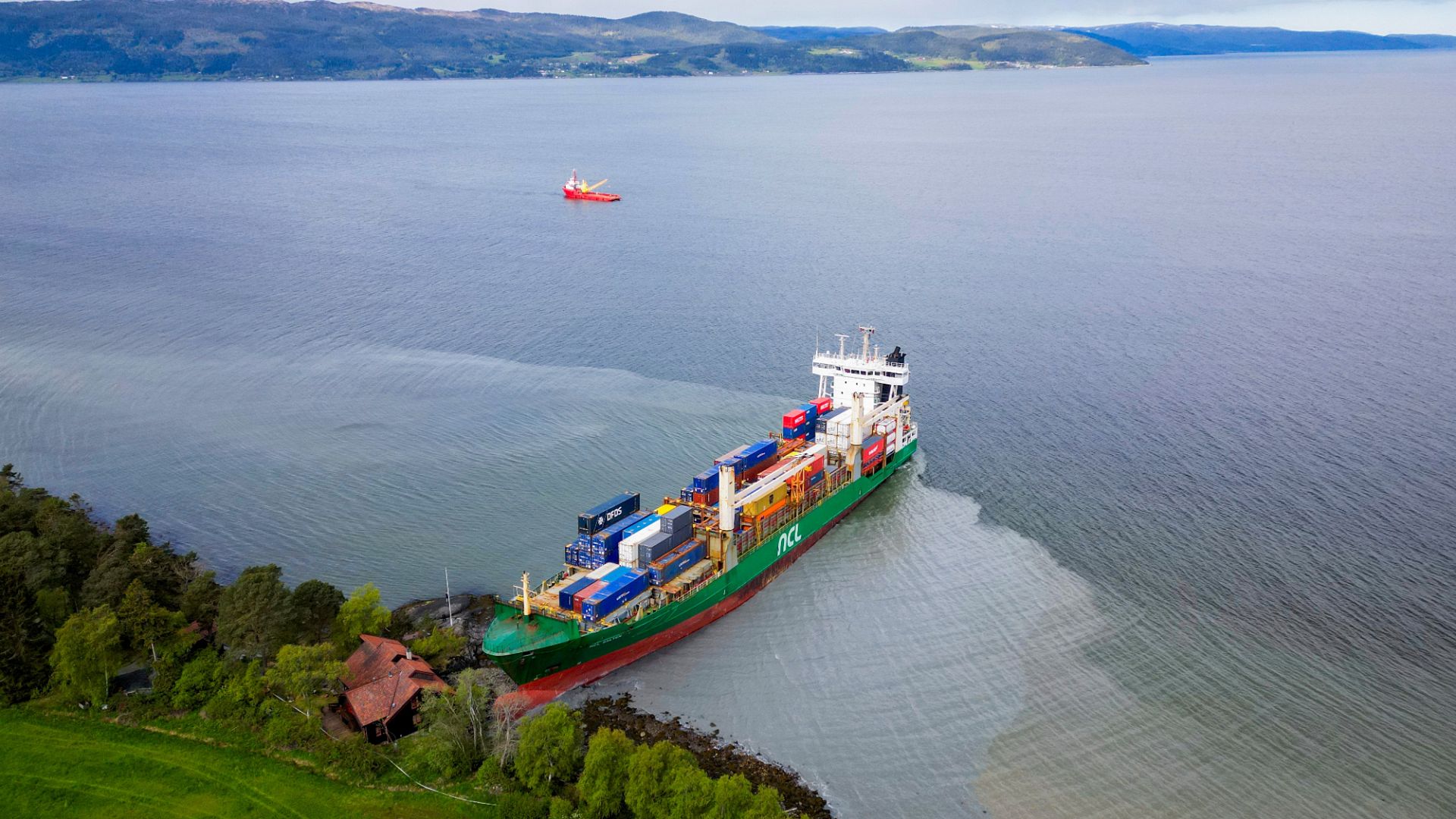 Navigator charged with negligence after cargo ship crashes into Norway ...
