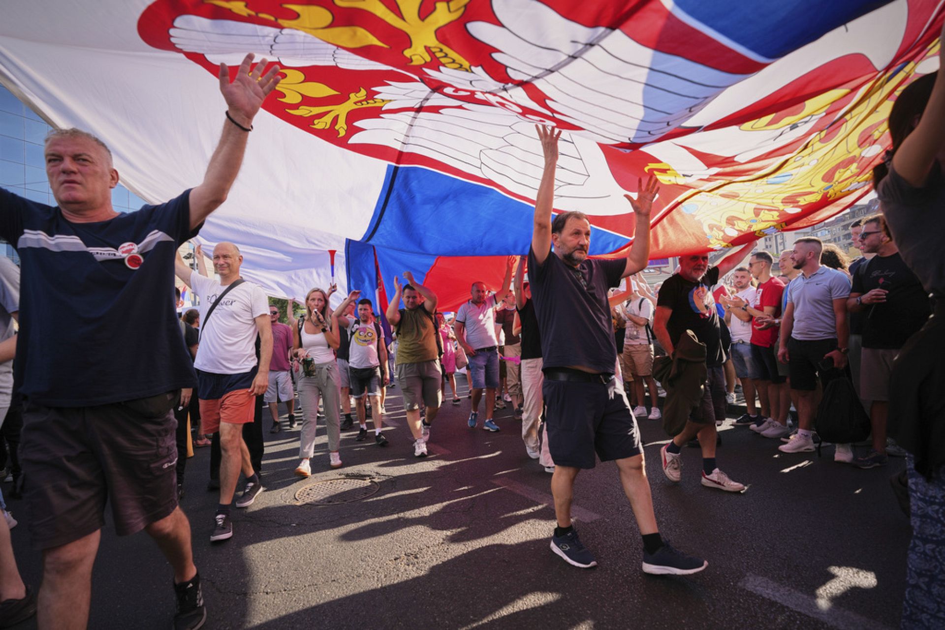 Riot police clash with student-led protesters calling for snap ...